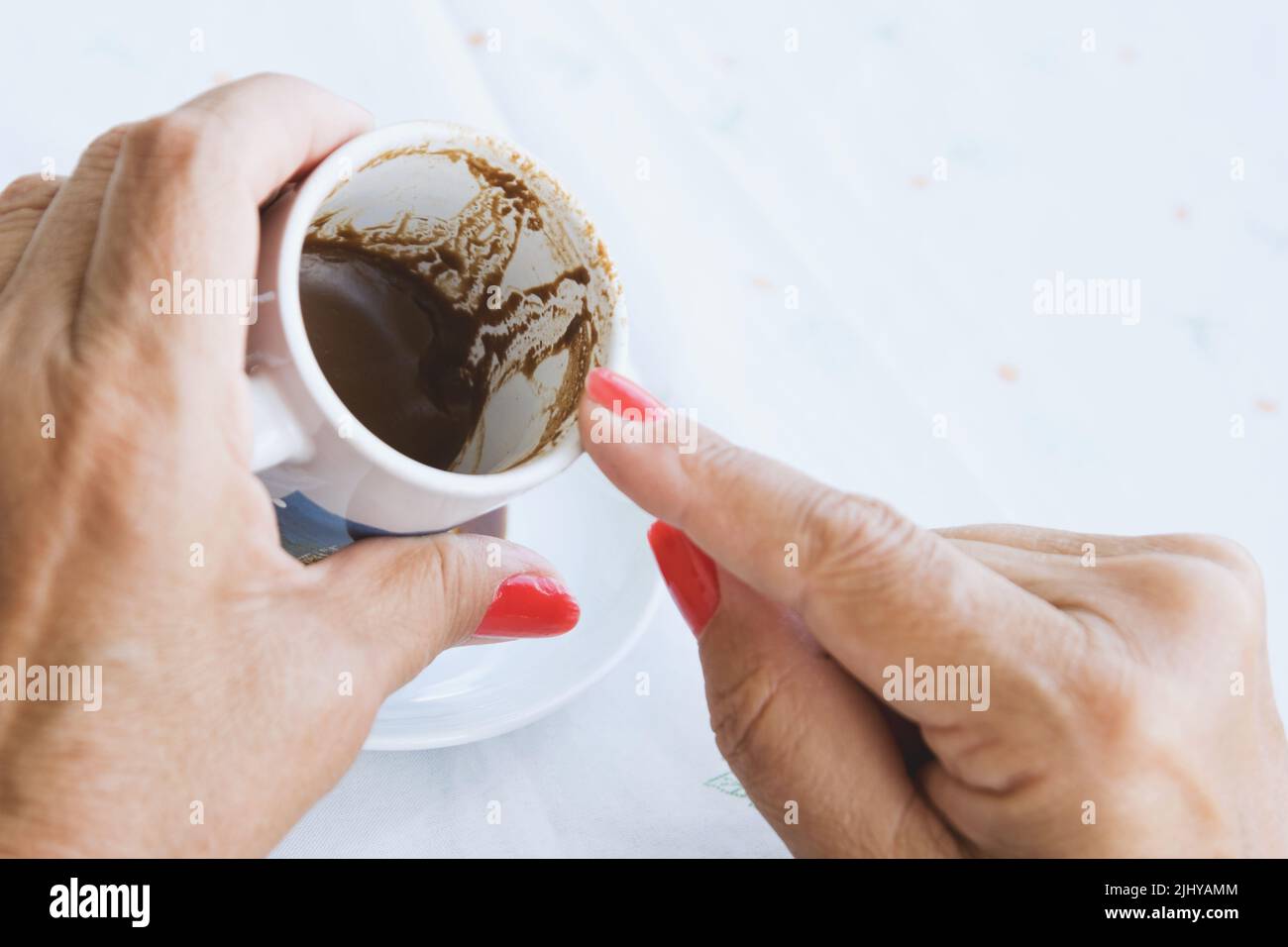 Turkish coffee fortune telling from first person view Stock Photo - Alamy