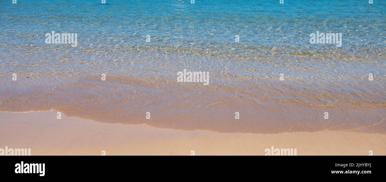 Beach background. Calm beautiful ocean wave on sandy beach. Sea view ...