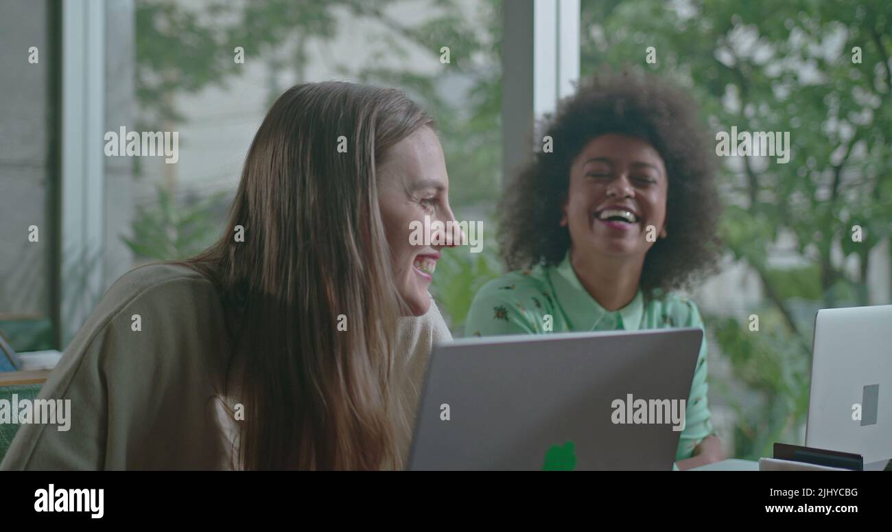 Group Of Three Women Talking At Coffee Shop Friend Sharing Story With