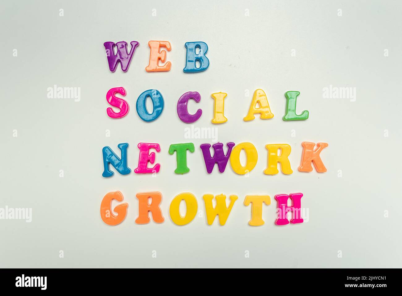 Web social network growth words written in colorful plastic letters on ...