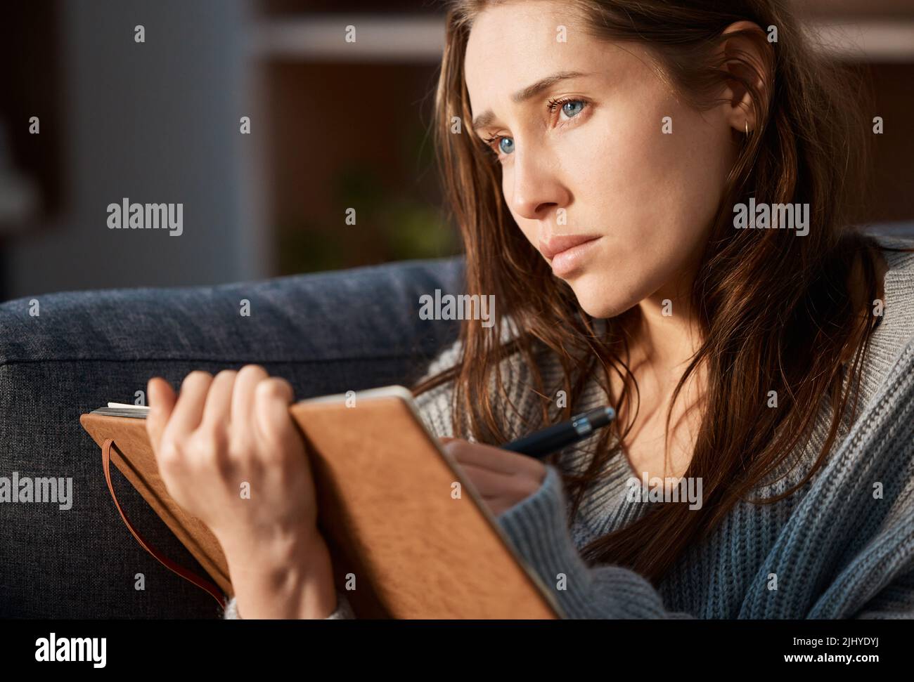 Person sad writing journal hi-res stock photography and images - Alamy