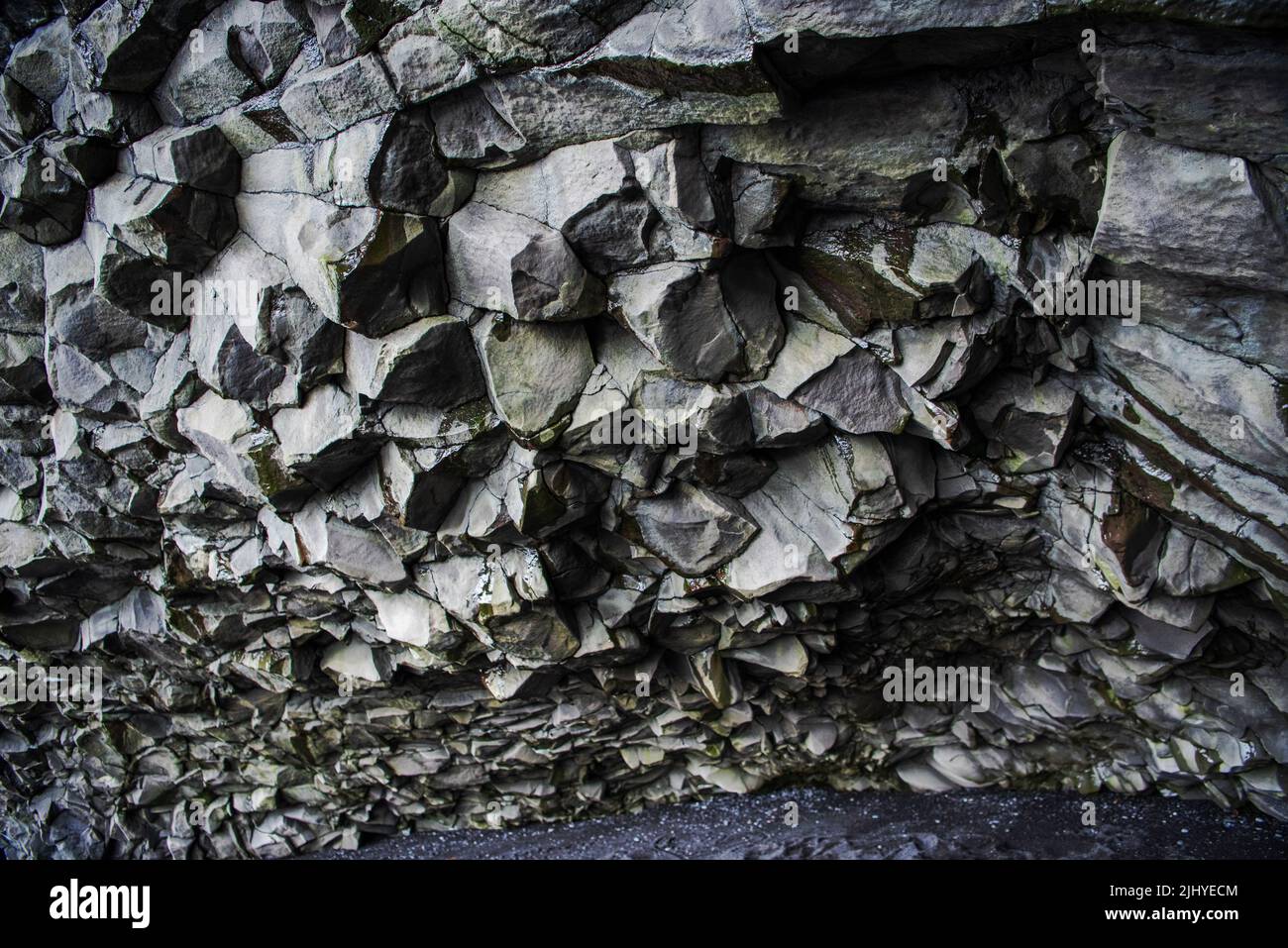 Basalt columns sticking out of the caling inside the Hálsanefshellir ...