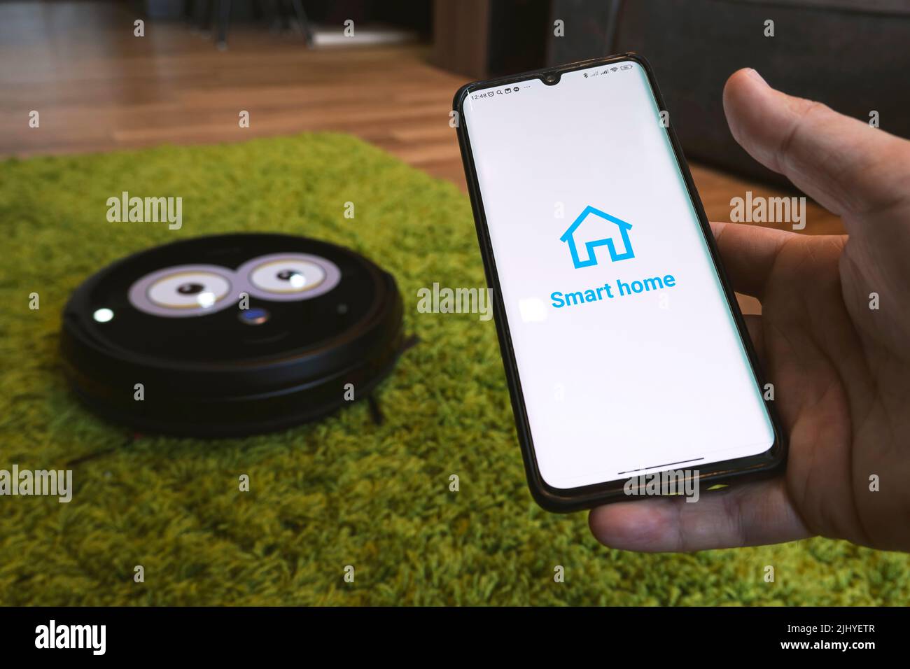 smart home app on smartphone. remote control of electronic devices in ...