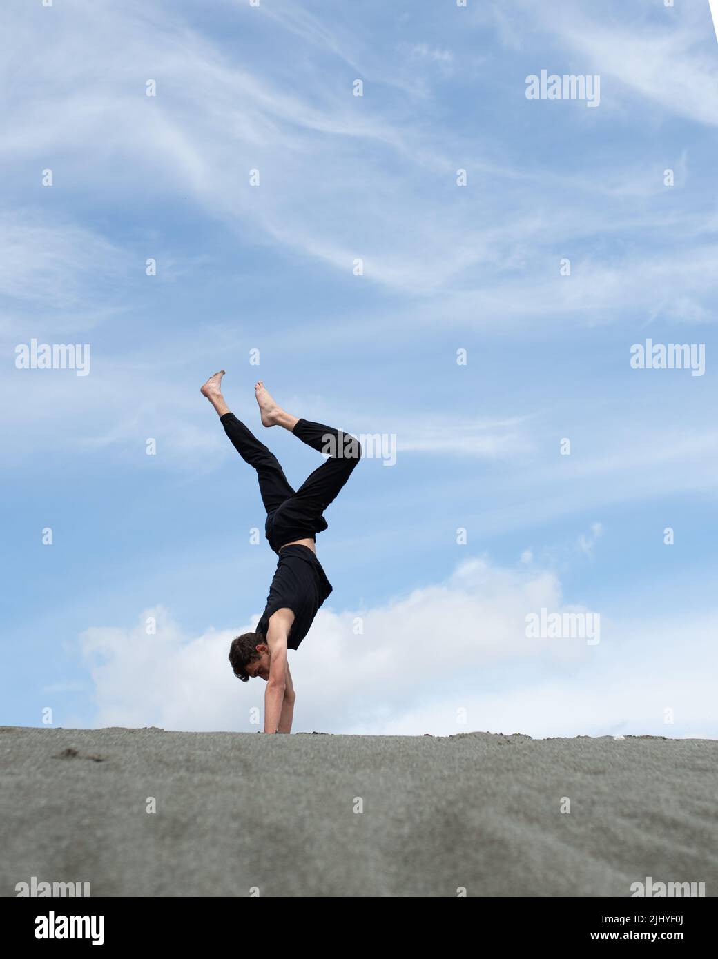 Man walking barefoot in desert hi-res stock photography and images - Alamy