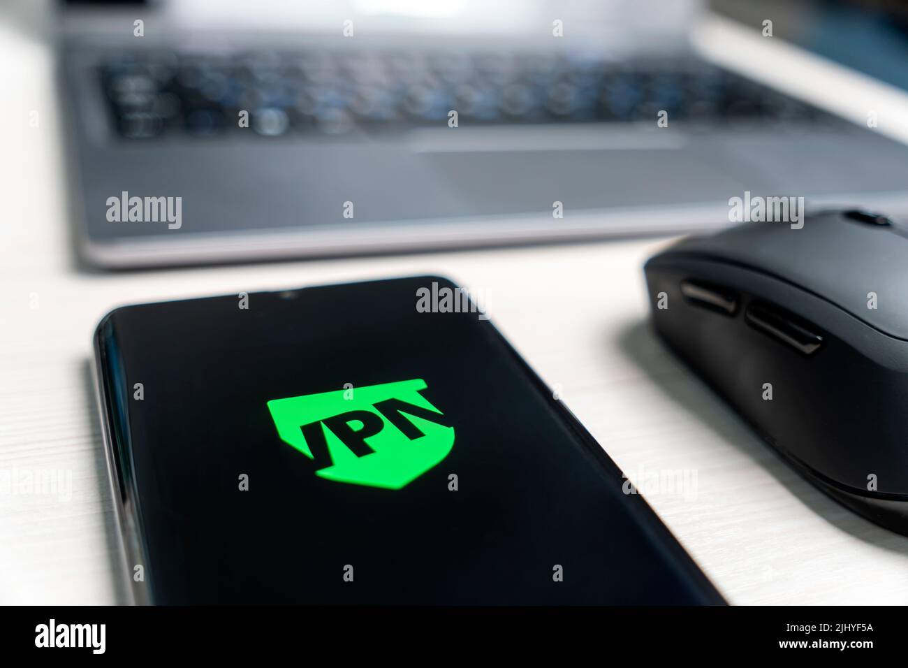 uses VPN application on smartphone. Virtual private network, anonymous, safe and secure internet ...