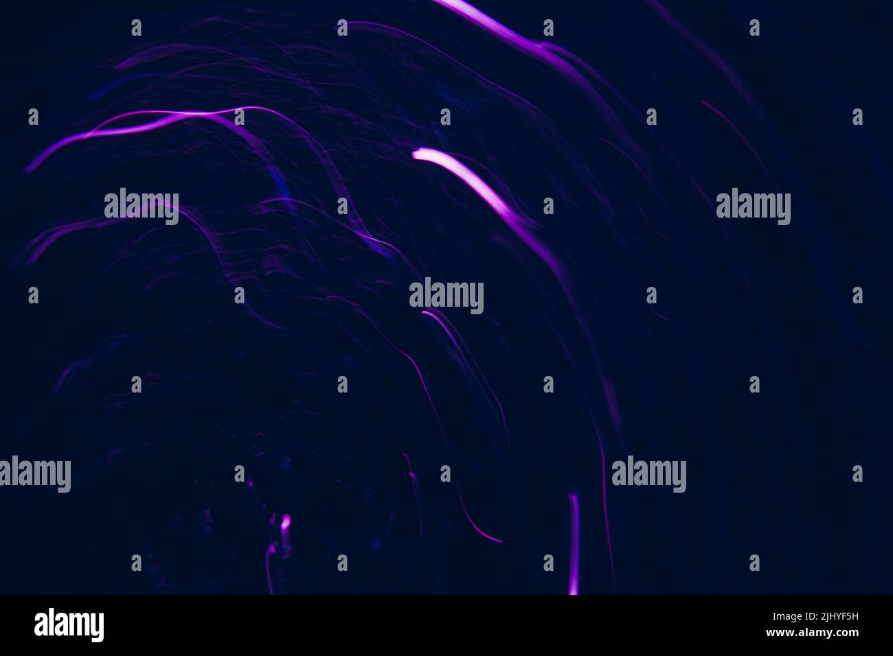 Abstract background of violet lines in motion Stock Photo - Alamy