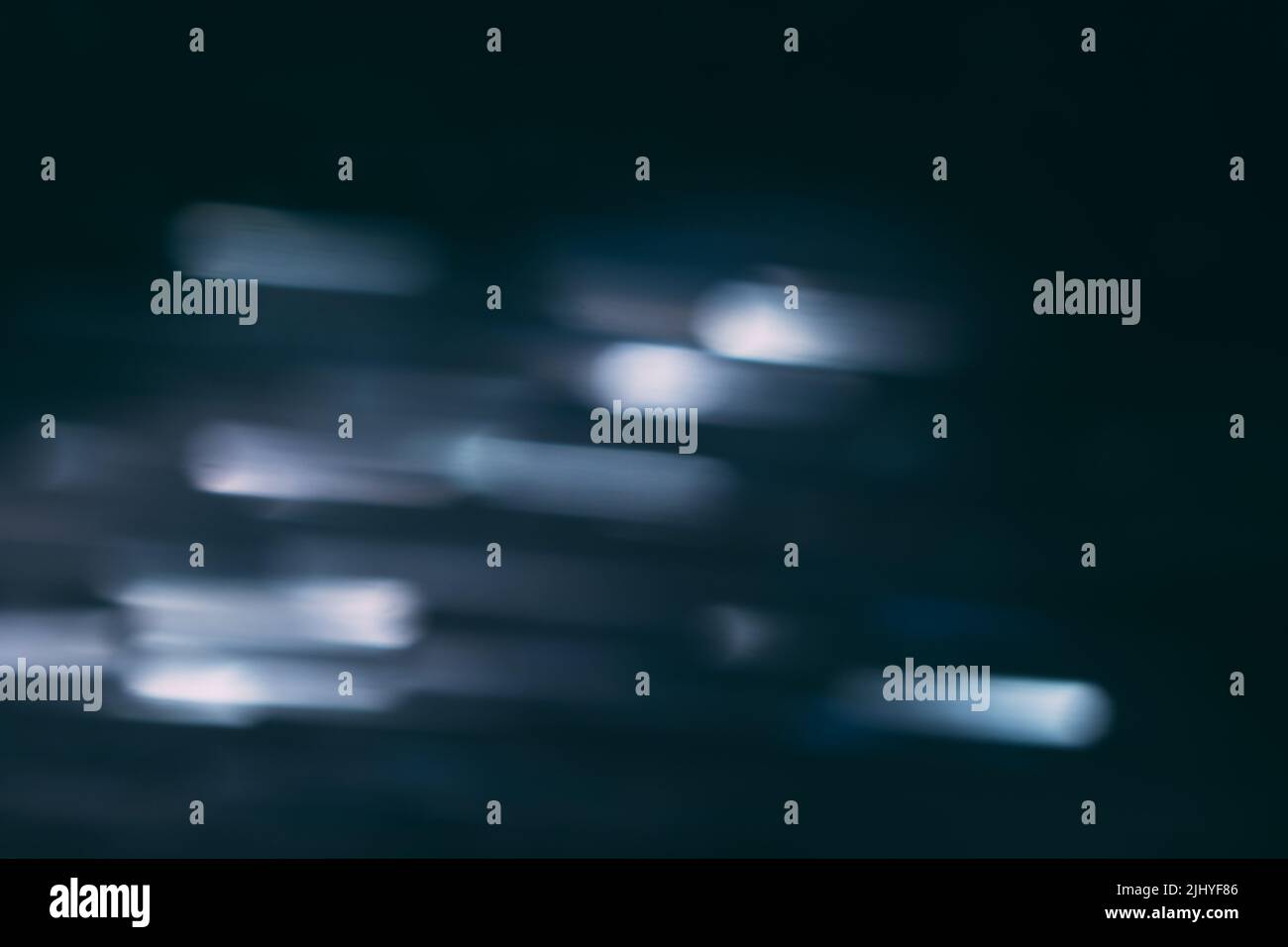 Abstract background of defocused light in motion Stock Photo - Alamy