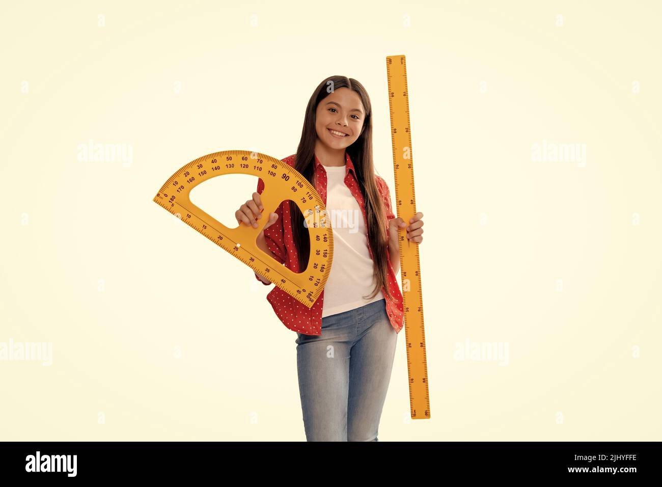 mathematics. smiling teen girl hold protractor ruler. back to school ...
