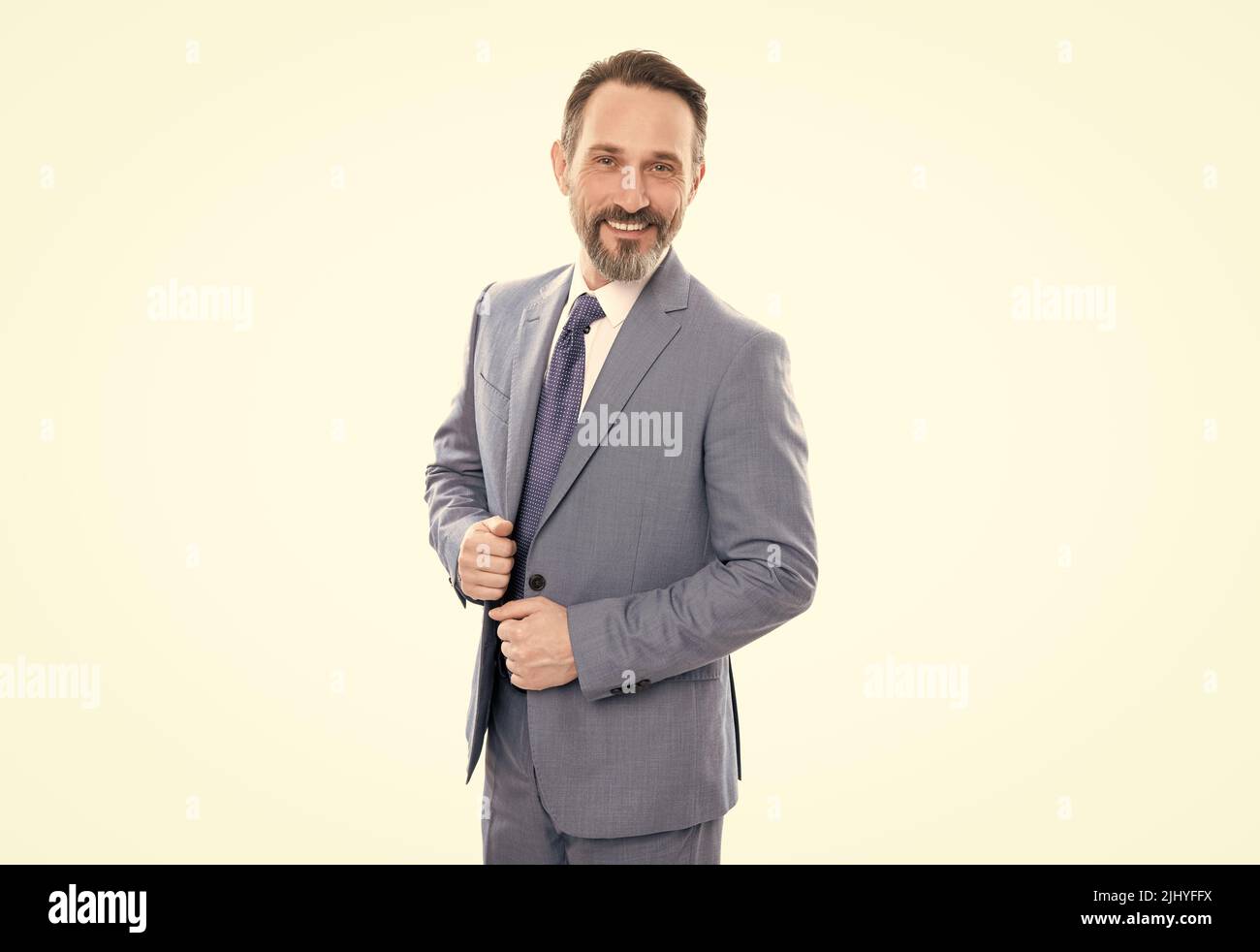 happy mature manager with grizzled hair in suit isolated on white ...