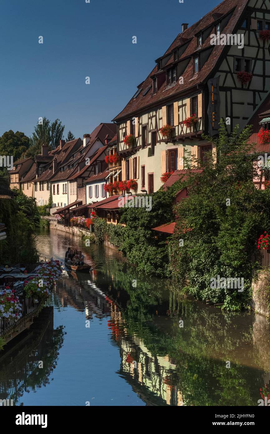 In Colmar, Alsace, Grand Est, France, tourists travel in flat-bottom ...