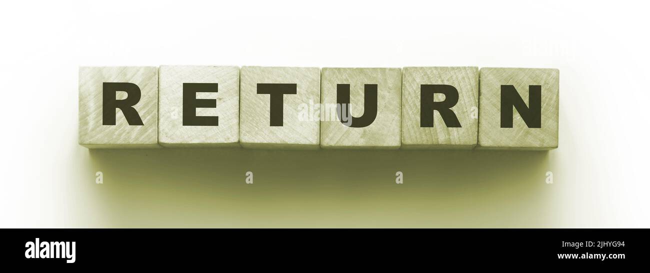 wooden blocks for word RETURN. Risk management and risk tolerance ...