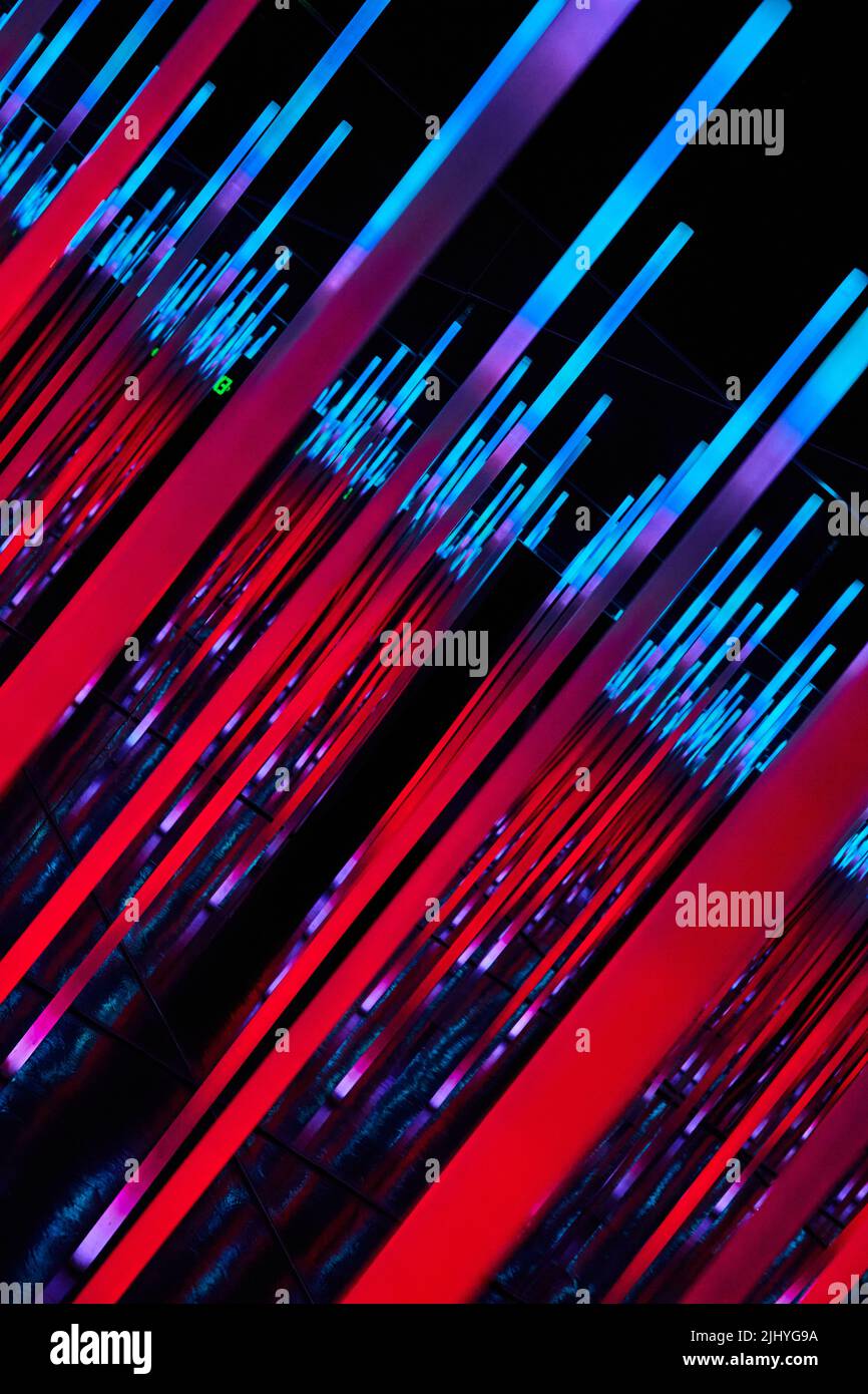 Angled and abstract LED neon lights in blue and red Stock Photo - Alamy
