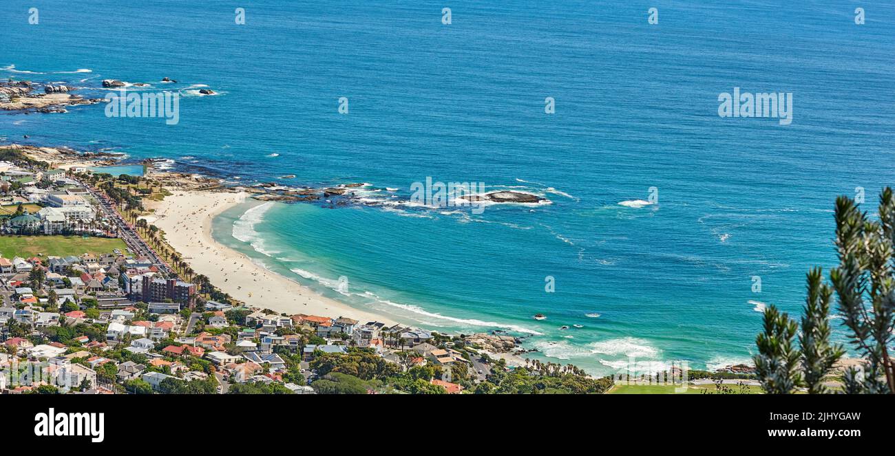 Landscape view of a beautiful coastal city near the beach on a summer ...