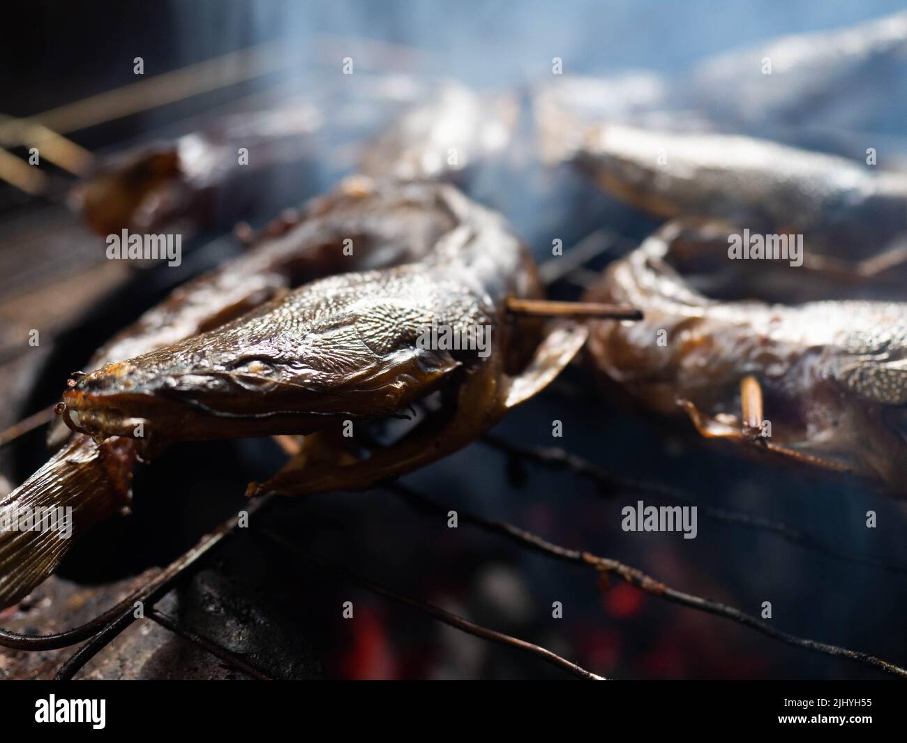 Picture of catfish that on a smoking process that make the taste more ...