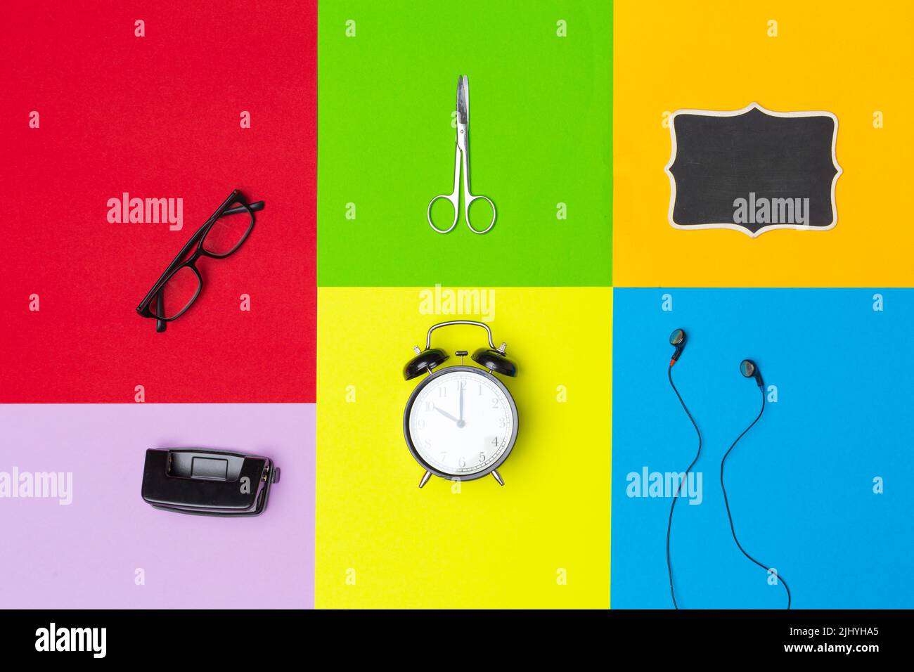 school supplies at colorful paper background Stock Photo - Alamy