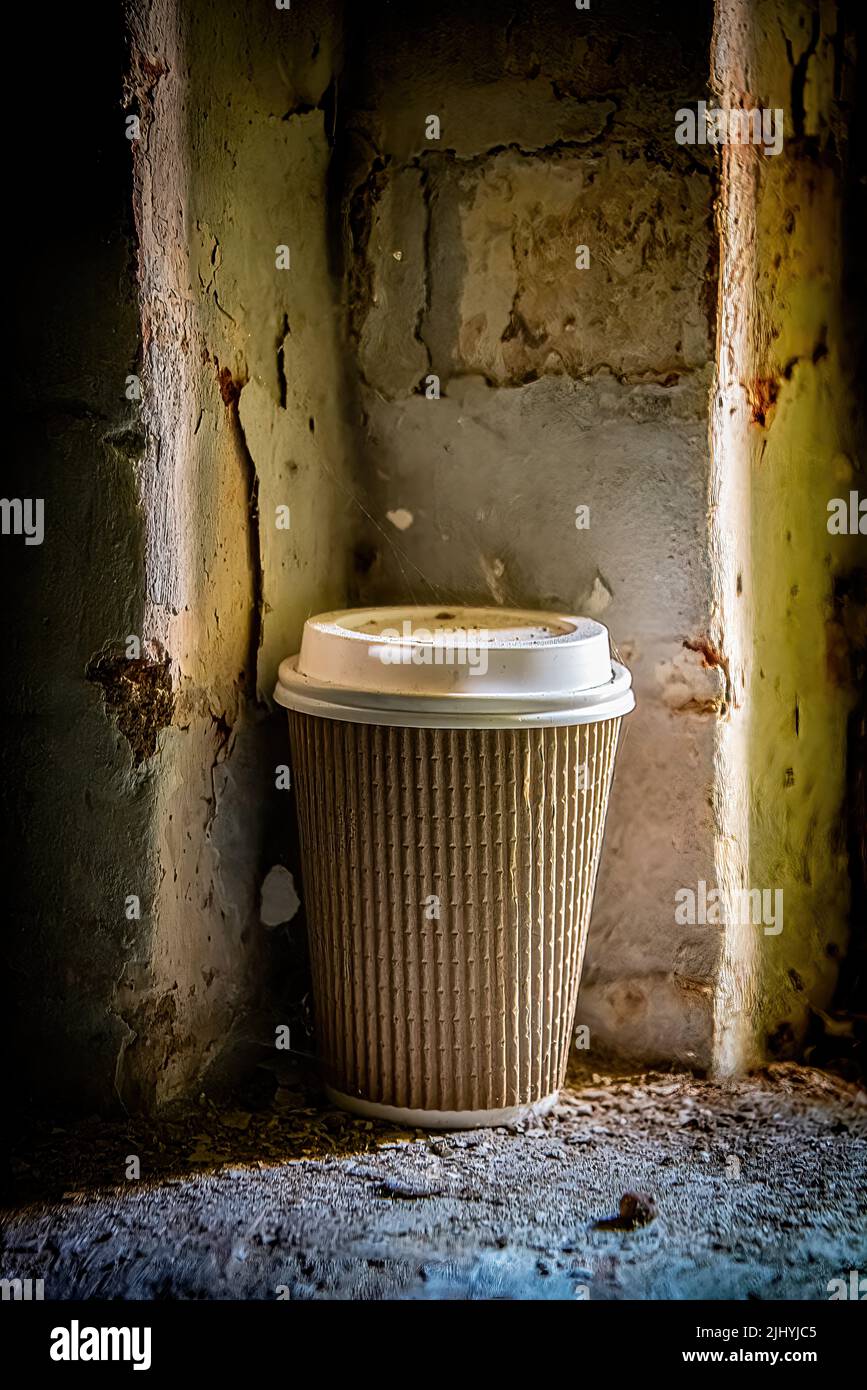 Discarded paper cup in derelict building Stock Photo - Alamy