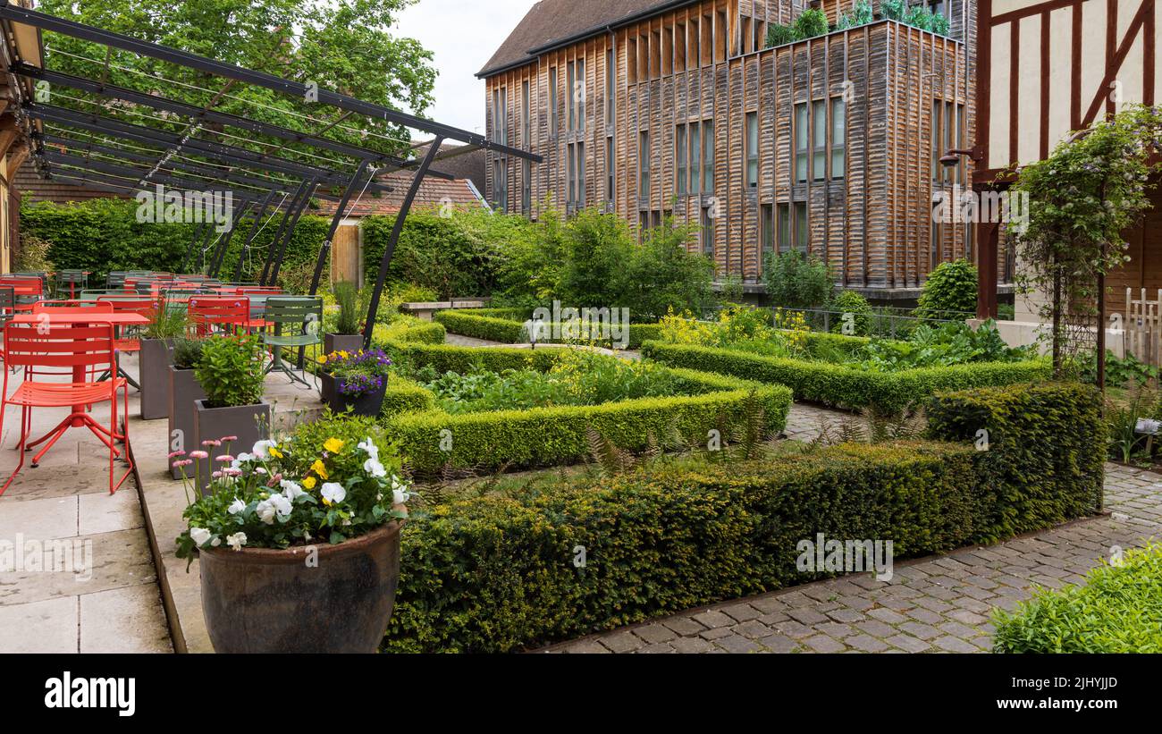 Beautiful garden and terrace of restaurant in medieval old town of ...