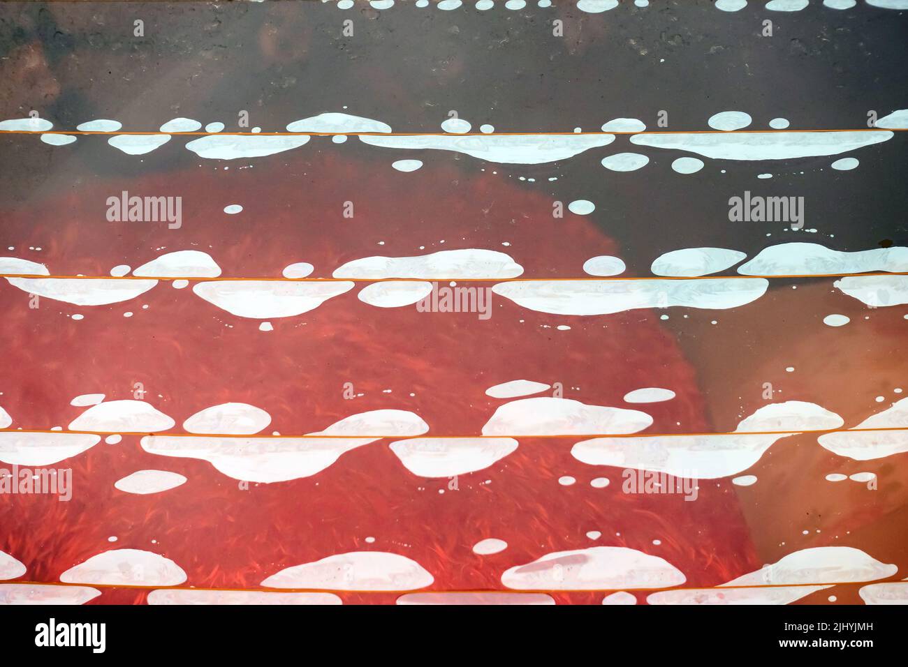 Close up to rear window of car with bubbles on glass very poor ...