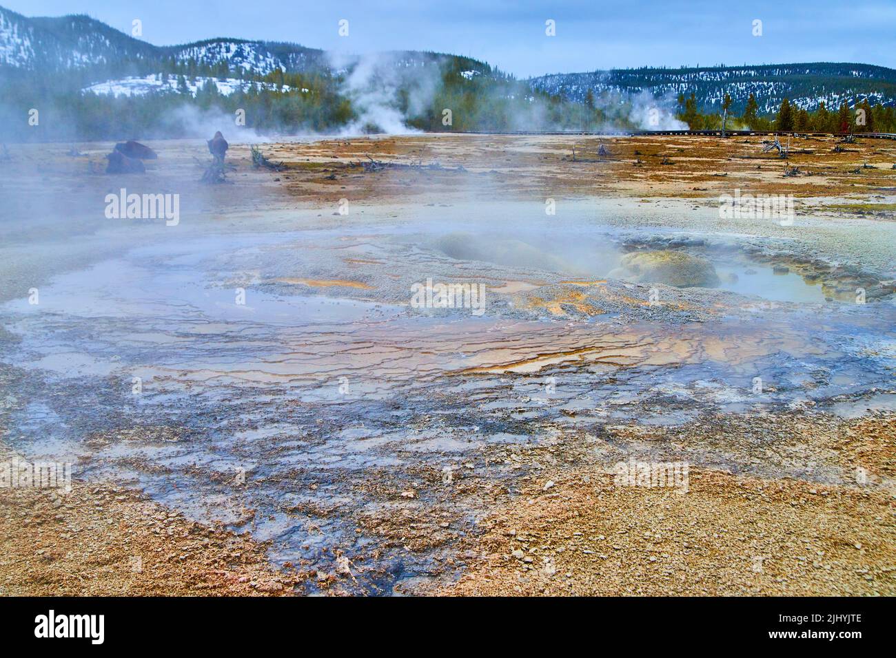 Yellowstone in winter with thermal pools of alkaline waters Stock Photo - Alamy