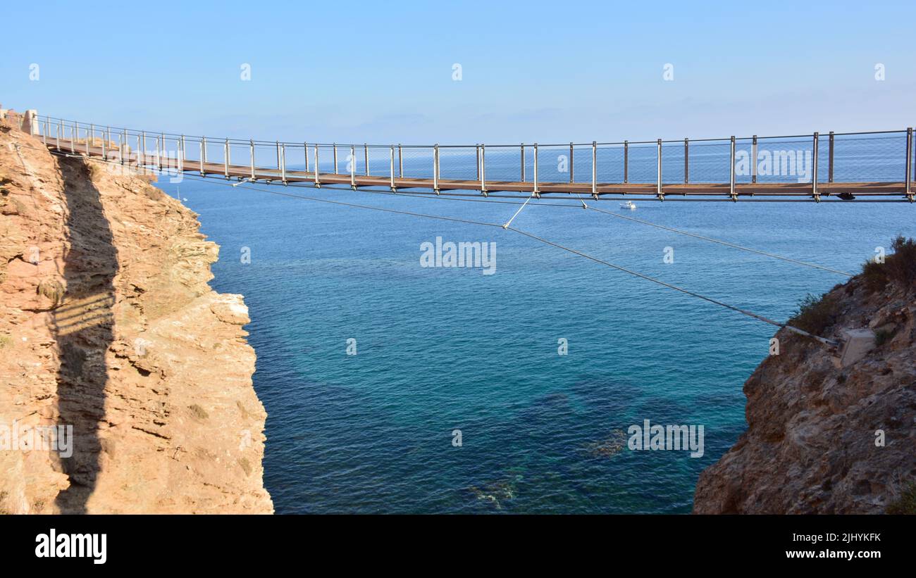 Puente colgante en Torrenueva Playa, Granada Stock Photo - Alamy