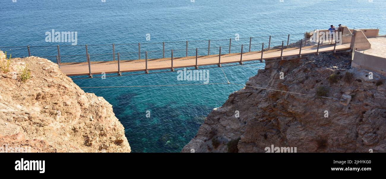 Puente colgante en Torrenueva Playa, Granada Stock Photo - Alamy