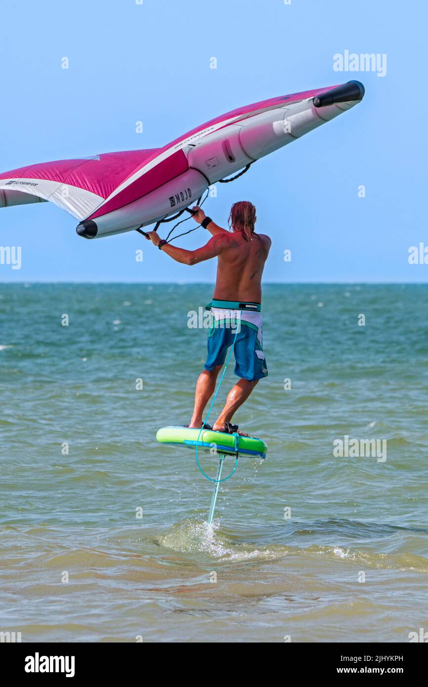 Wing foiling / wing surfing on the North Sea showing wingboarder / wing ...