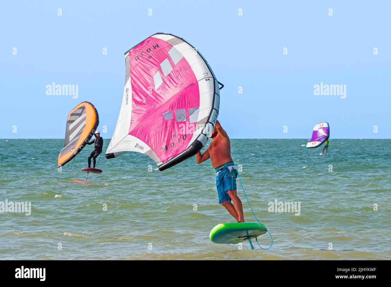 Wing foiling / wing surfing on the North Sea showing wingboarders ...