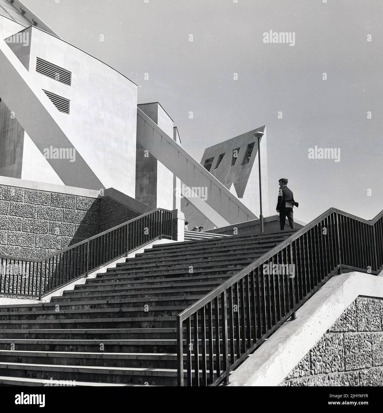 1969, historical, man on exterior stairs, Liverpool Metropolitan ...