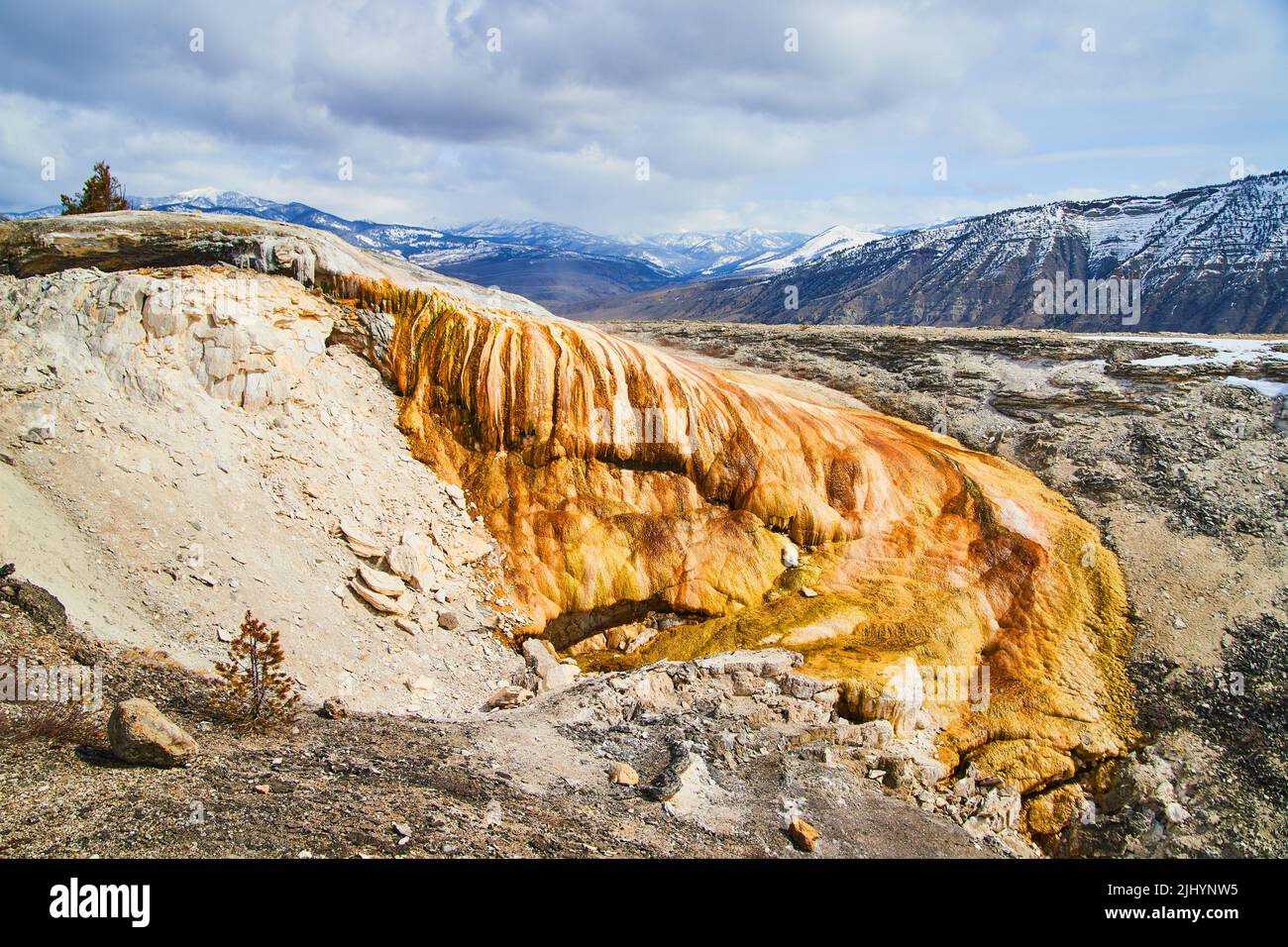 Yellowstone mound of warm colors in mountains Stock Photo - Alamy
