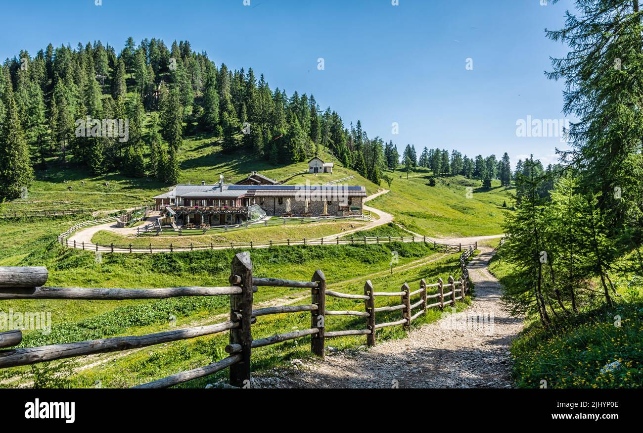 The mountain hut - Malga Romeno, at the feet of the Mount Roen, italian ...