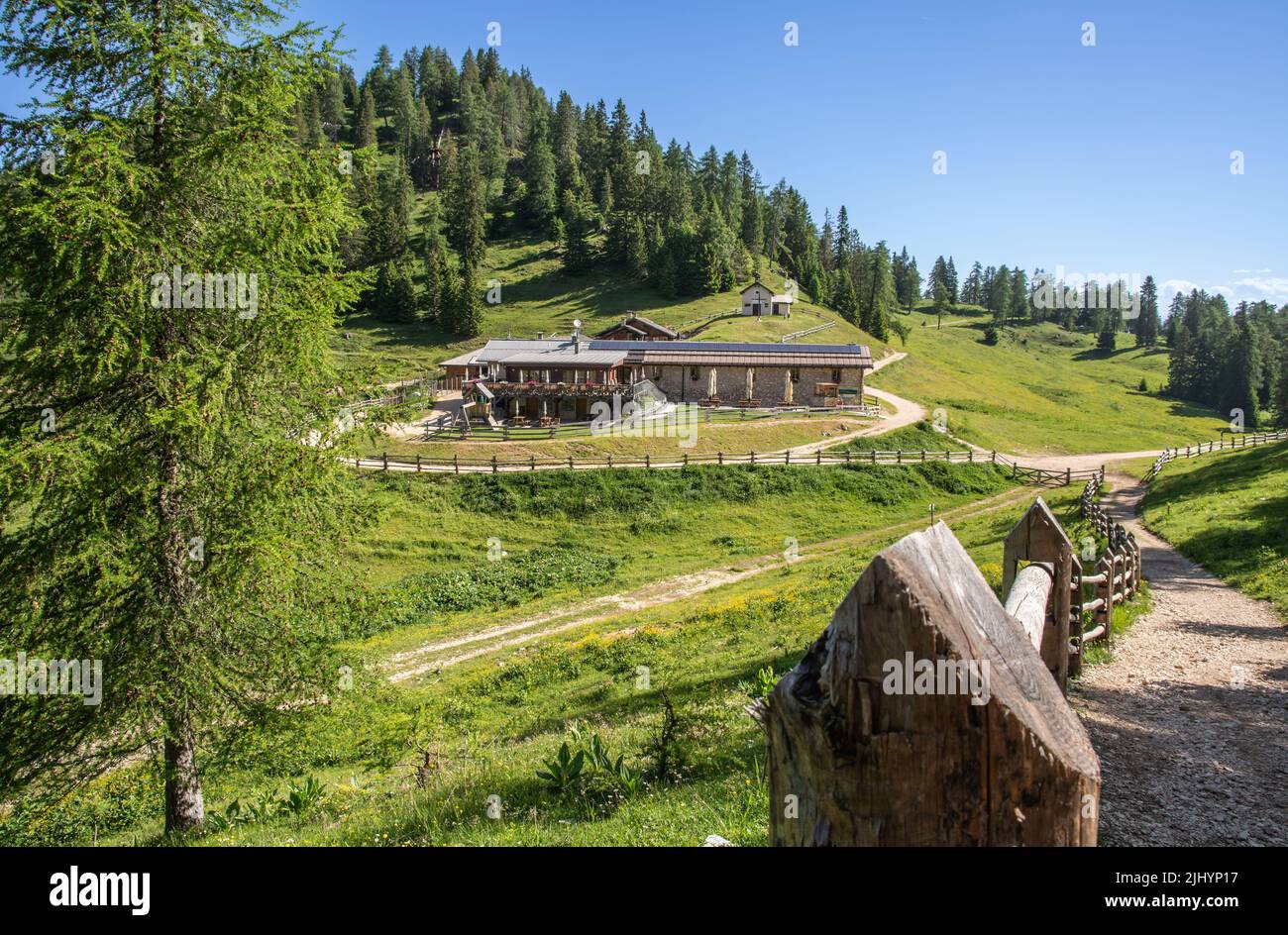 The mountain hut - Malga Romeno, at the feet of the Mount Roen, italian ...