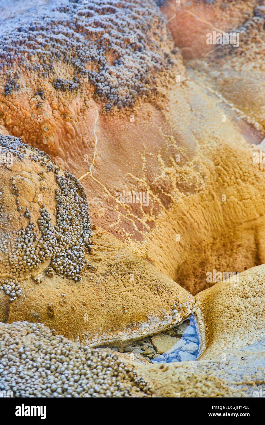 Yellowstone geyser detail of alkaline formations Stock Photo - Alamy