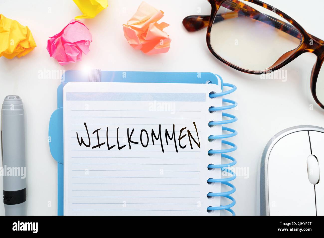 An Illustration of glasses, crumpled papers, mouse, pen and a notebook ...