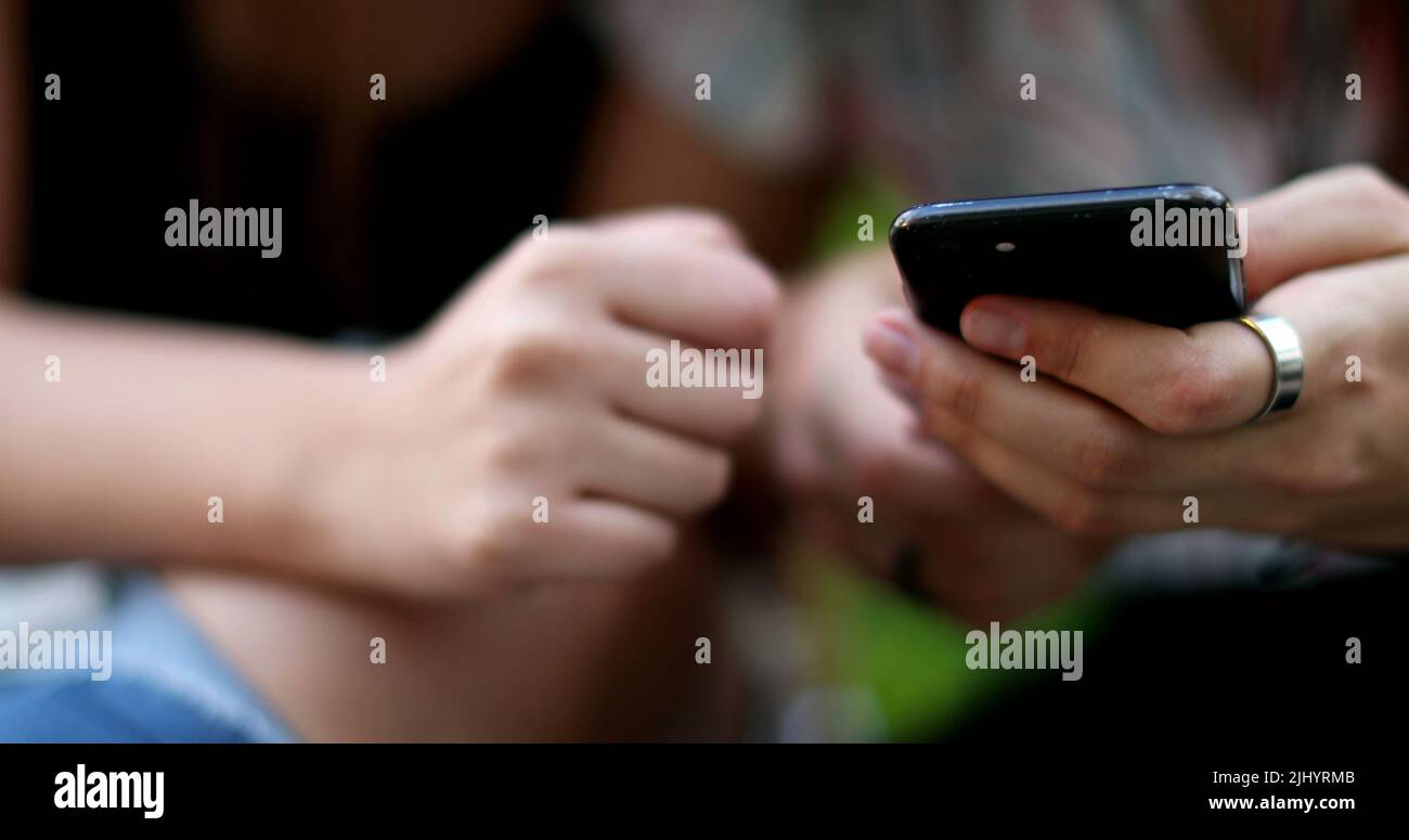 Close-up hands holding smartphone. People using cellphone Stock Photo ...