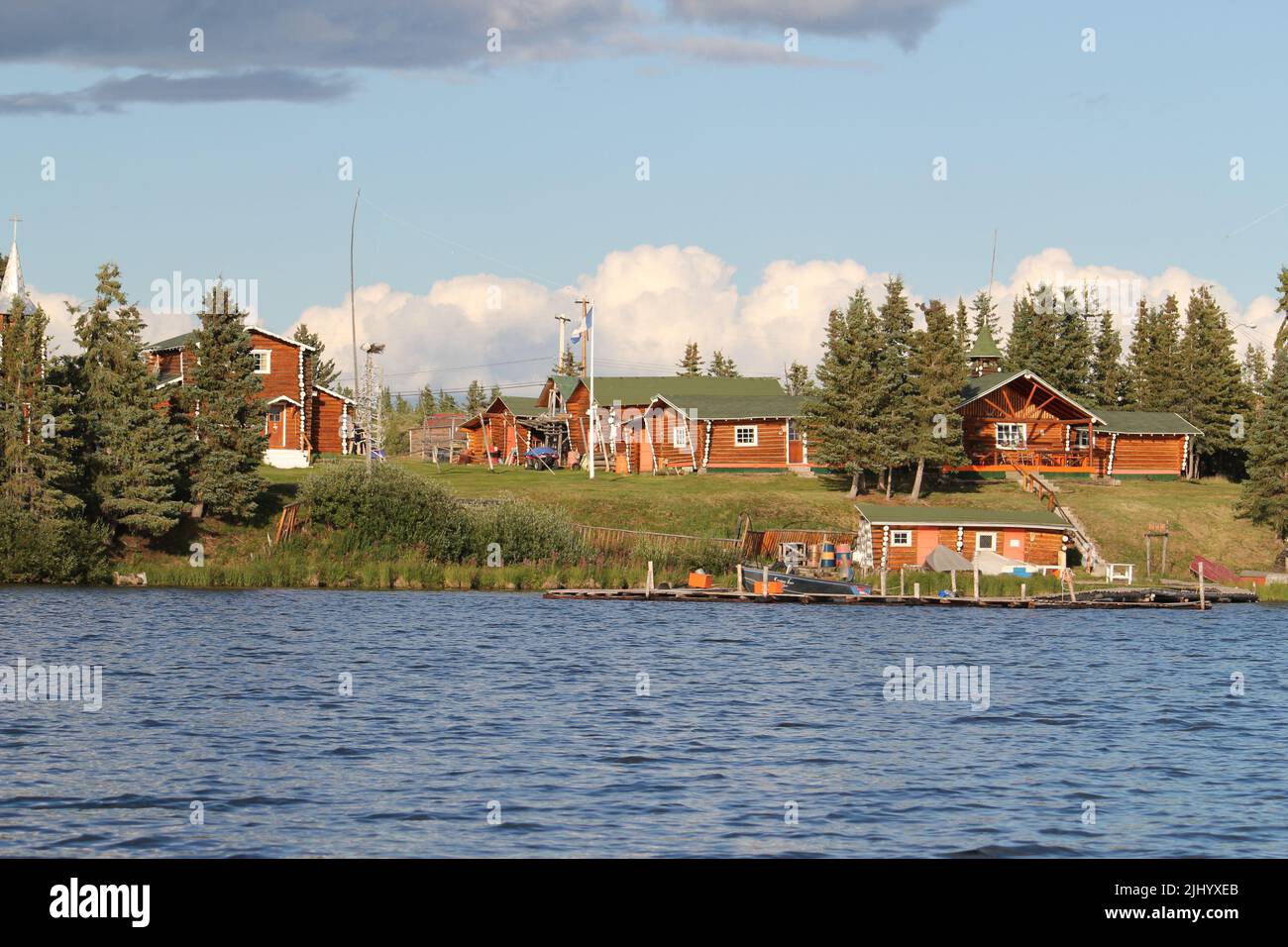 Log houses in the Indigenous community of Colville Lake in the summer ...