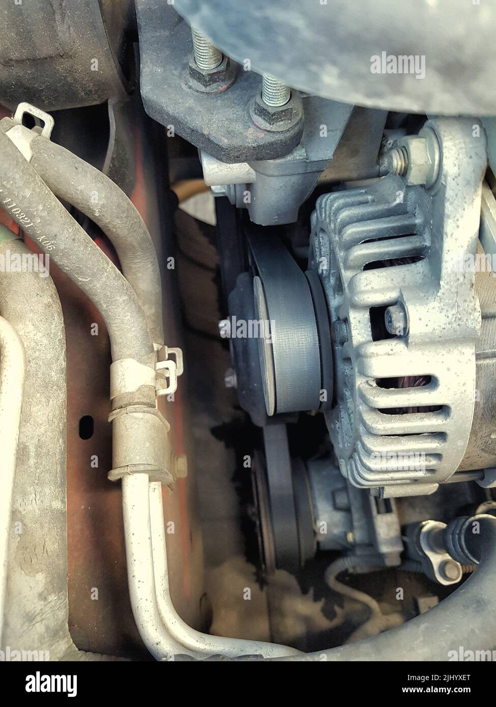 Timing belt along a car engine. Car servicing, Car inspection. Car ...