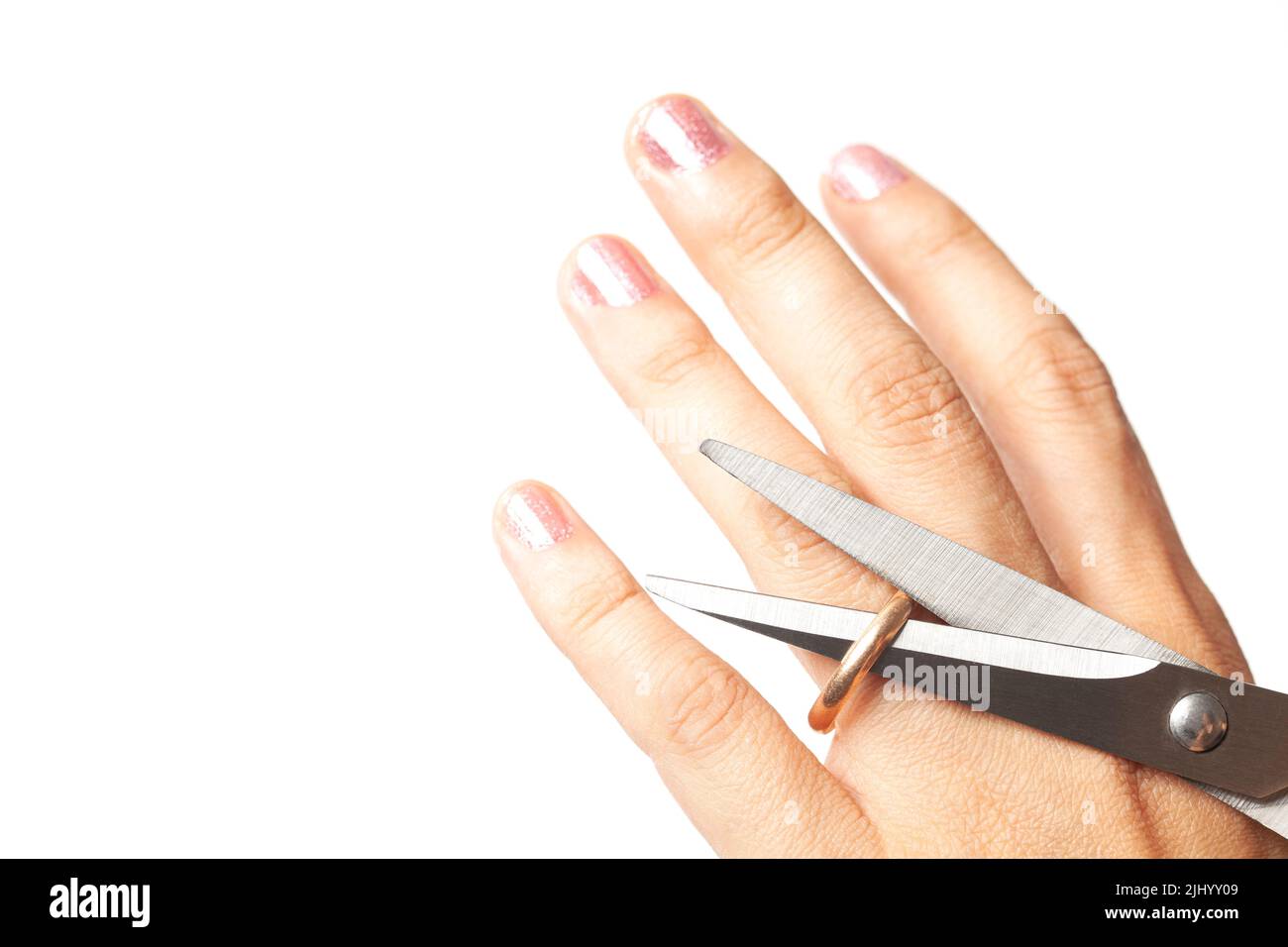 woman's hand cuts an engagement ring with scissors Stock Photo - Alamy