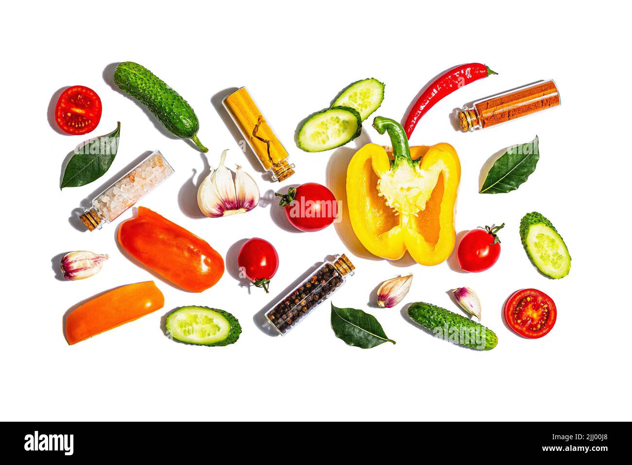 Assorted fresh vegetables and spices isolated on white background. Ripe ...
