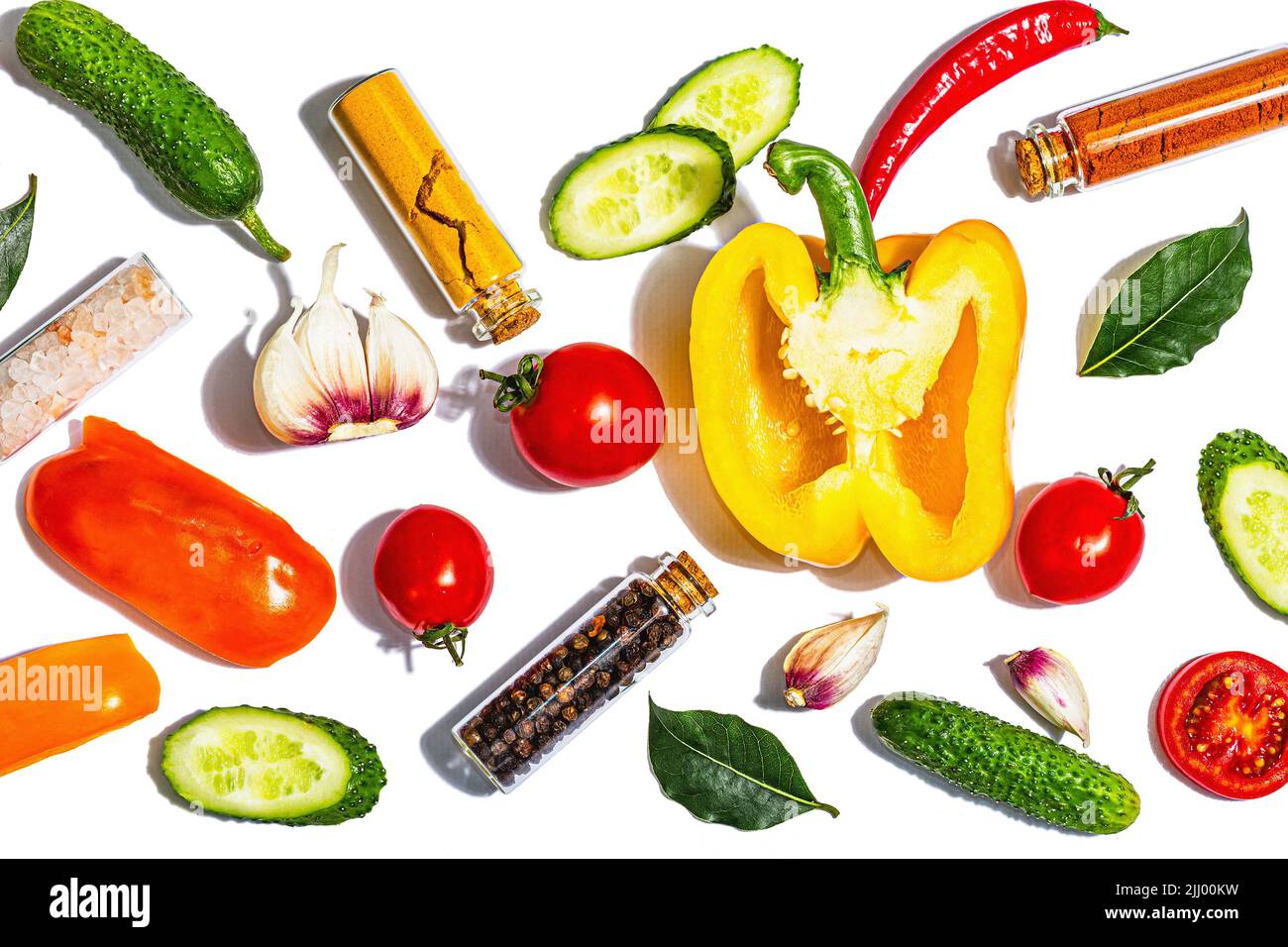 Assorted fresh vegetables and spices isolated on white background. Ripe ...