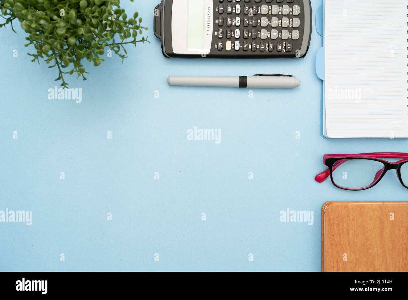 A tidy workspace setup with office stationery and free space in the ...