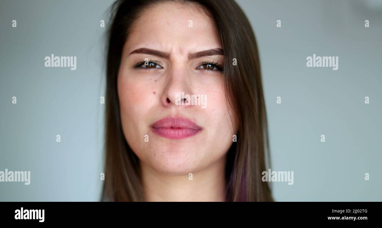 Girl gives the finger to camera, woman showing middle finger, offensive ...