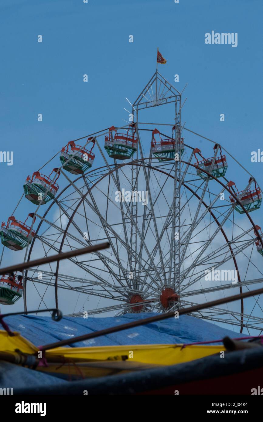 Giant ferries wheels with clear blue sky Stock Photo - Alamy