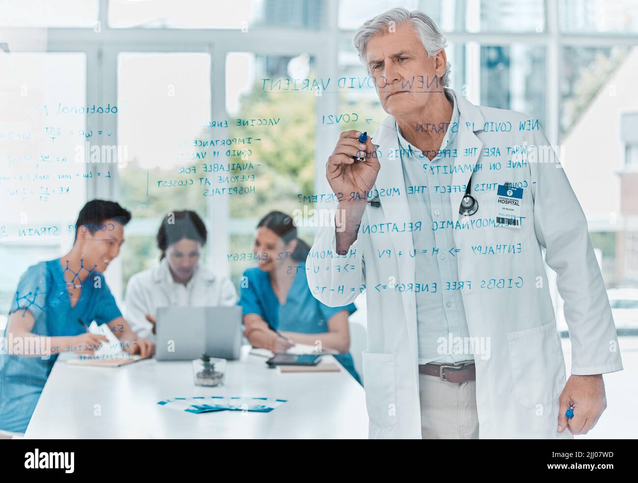 Unpacking what the new variant entails. a senior doctor brainstorming ...