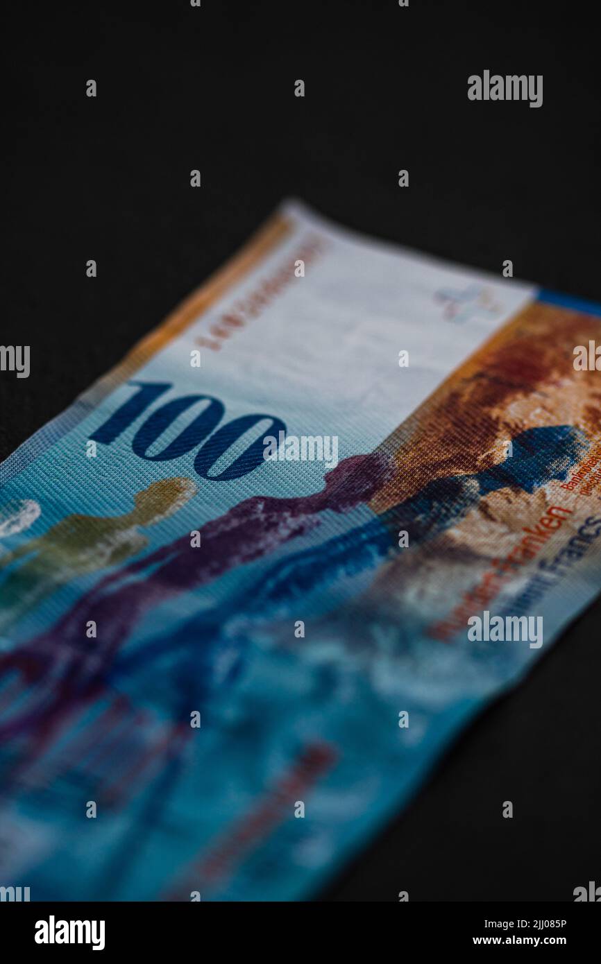 Selective focus on detail of 100 swiss franc banknote. Close up macro ...
