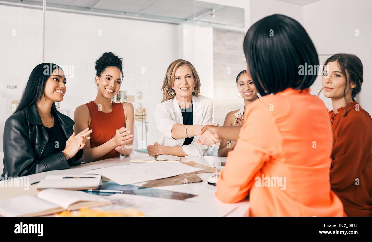The start of great things. two businesswomen shaking hands in a meeting ...
