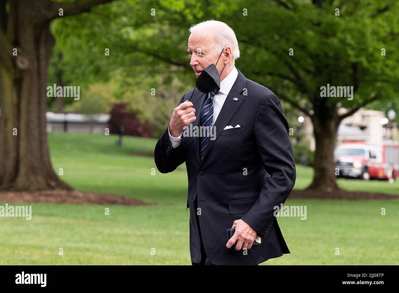 Washington, DC, USA. 1st May, 2022. President JOE BIDEN taking off his ...