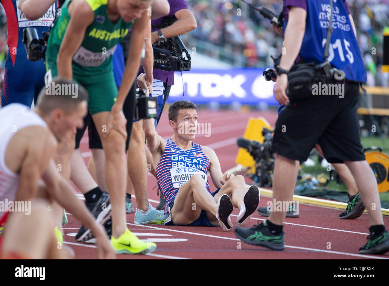 Jake Wightman sits on the ground stunned after wining the men’s 1500m ...