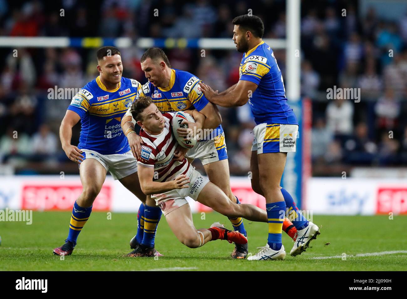 Wigan Warriors' Jai Field is tackled during the Betfred Super League ...