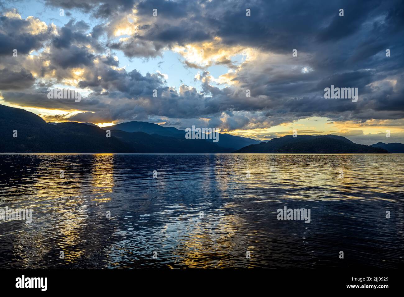 Dramatic sunset sky over the Harrison Lake in Harrison Hot Springs ...