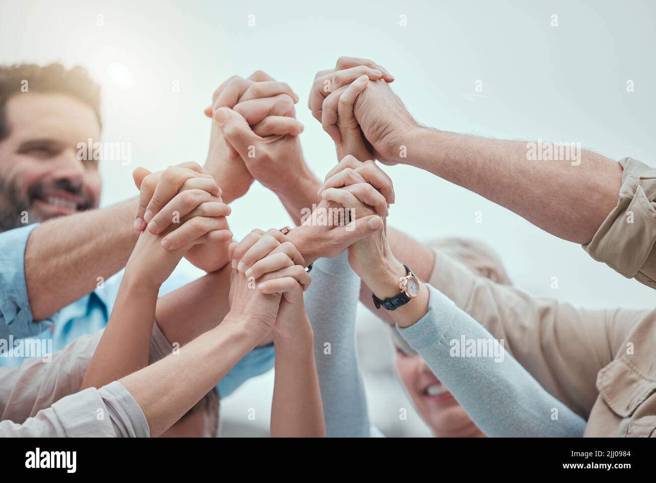 Weve got each other life. a family holding hands at home Stock Photo ...